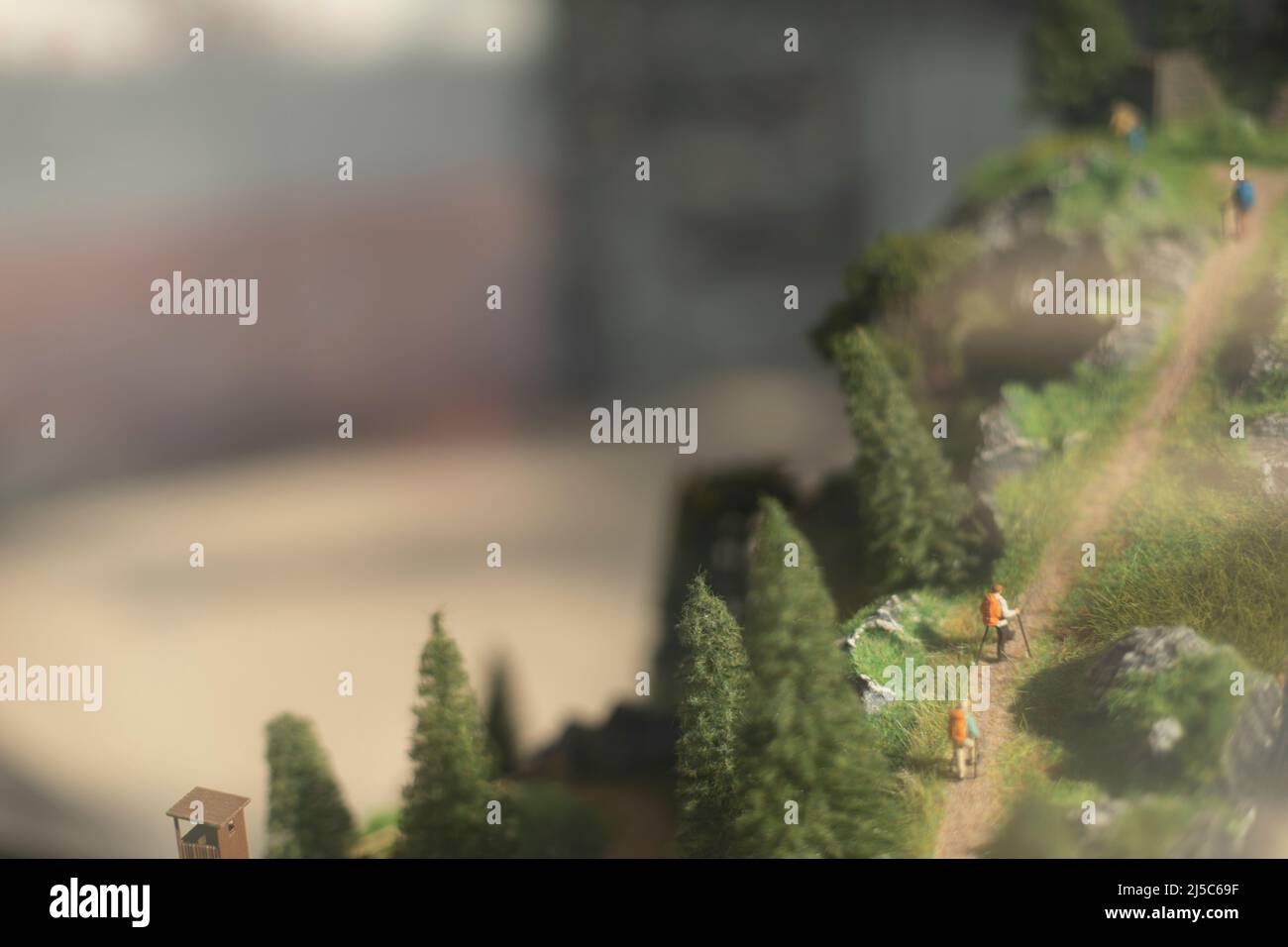 Model of small town. Model of mountain locality. Small people and ...