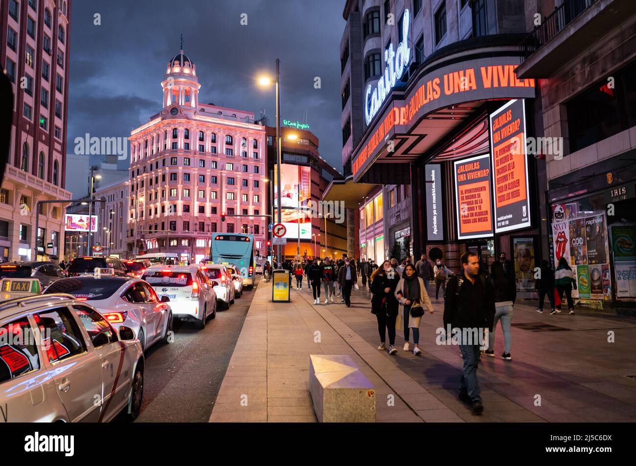 Gran Via with La Adriatica Building and Capitol Theatre at night ...