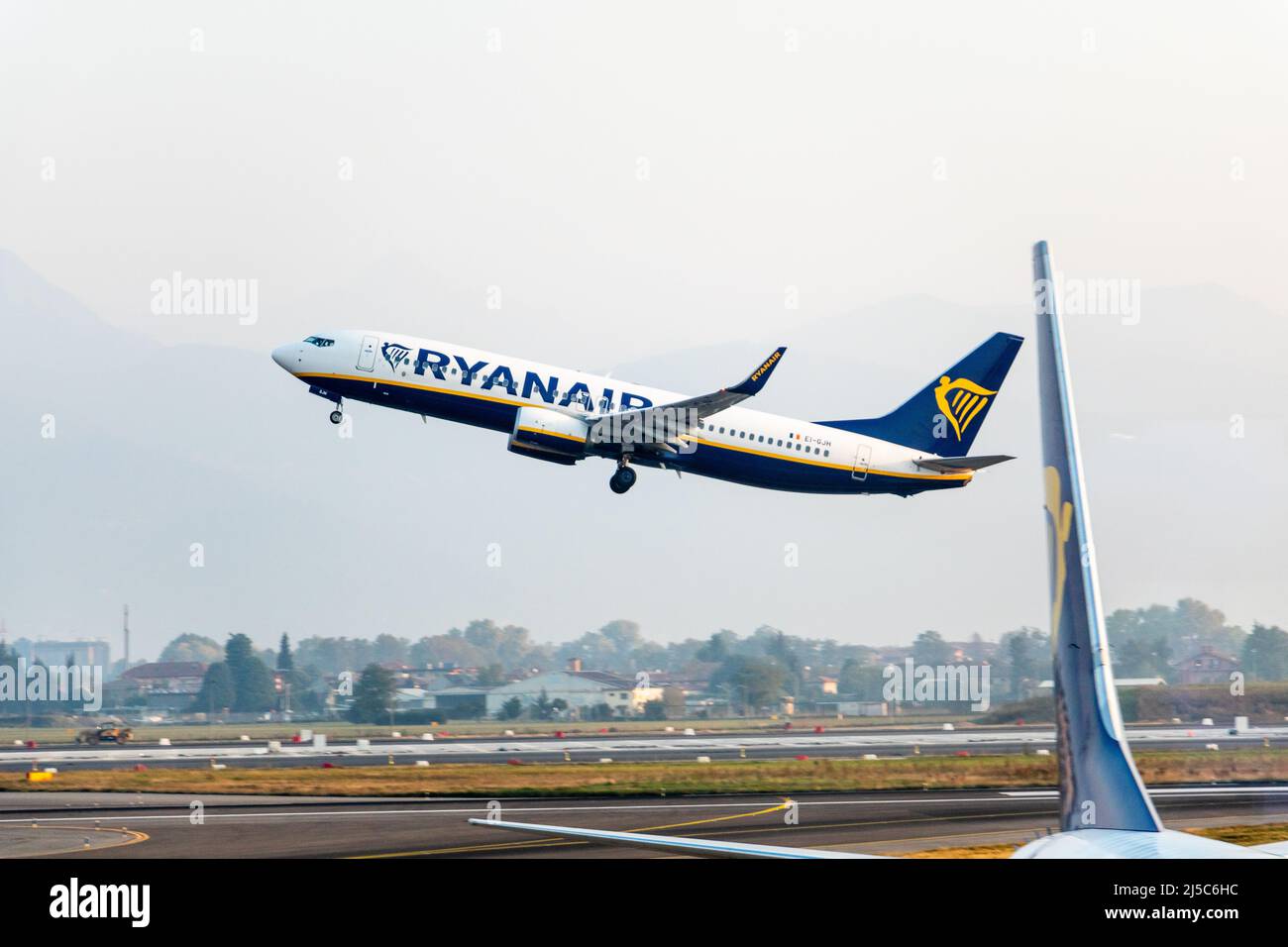 Ryanair airplane taking off the runway Stock Photo - Alamy