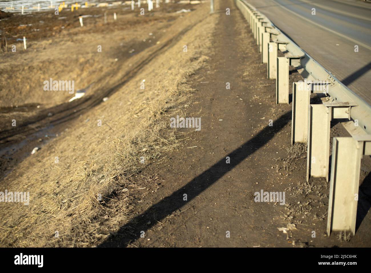 Side of road. Highway details. Bumper along road Stock Photo - Alamy