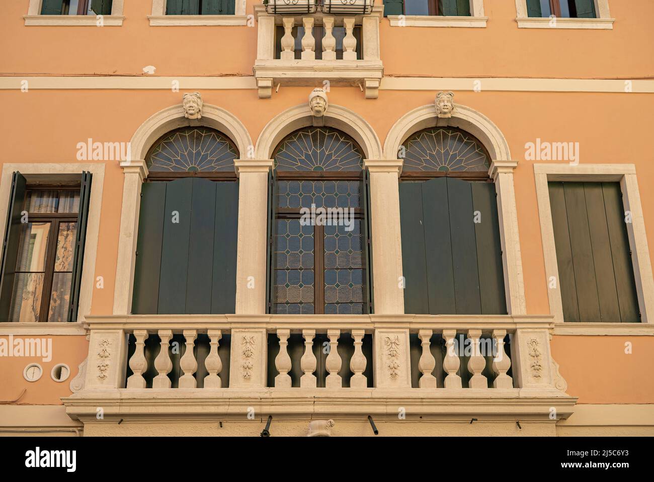 Detail of Balcony with arch in historic building Stock Photo - Alamy