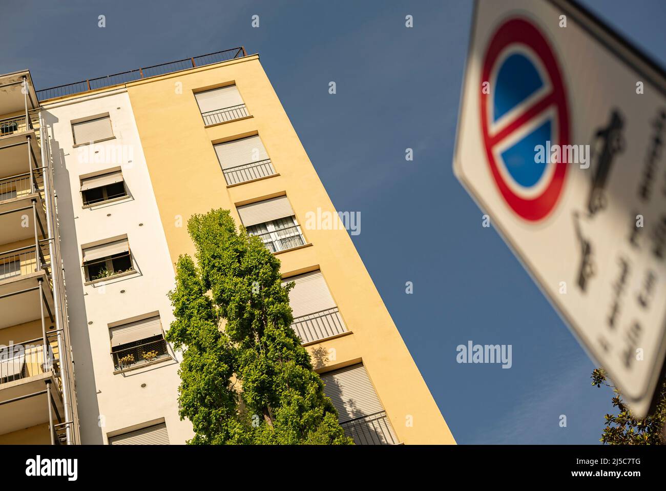 Building and road sign detail in the city Stock Photo - Alamy