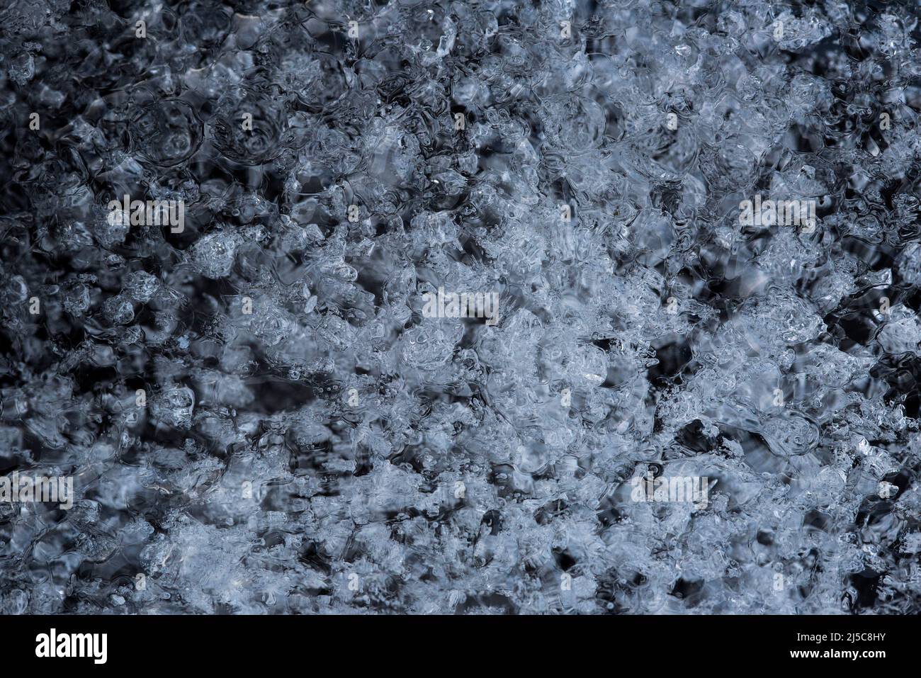 Gas bubbles trapped in ice. Toned image for abstract background Stock ...