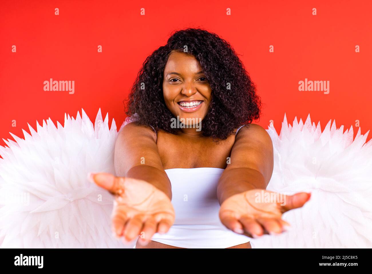 american woman matchmaker in red background valentine day Stock Photo ...
