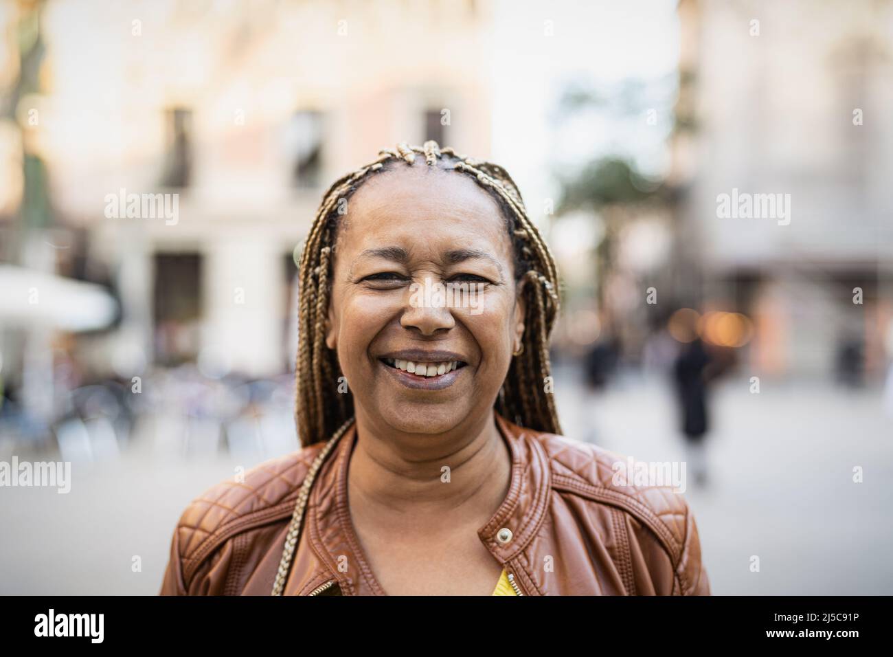 Happy African Woman Having Fun In City Elderly People Concept Stock