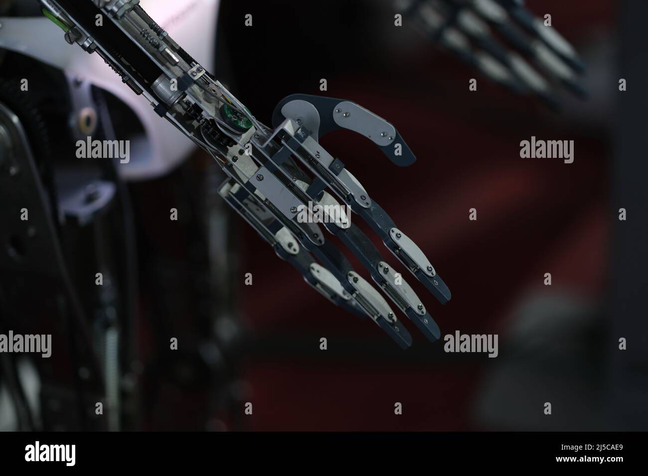 Dark metal robot arm. Technology and science concept Stock Photo - Alamy