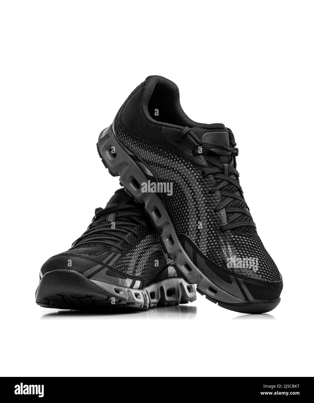 Black and white running shoes hi-res stock photography and images - Alamy