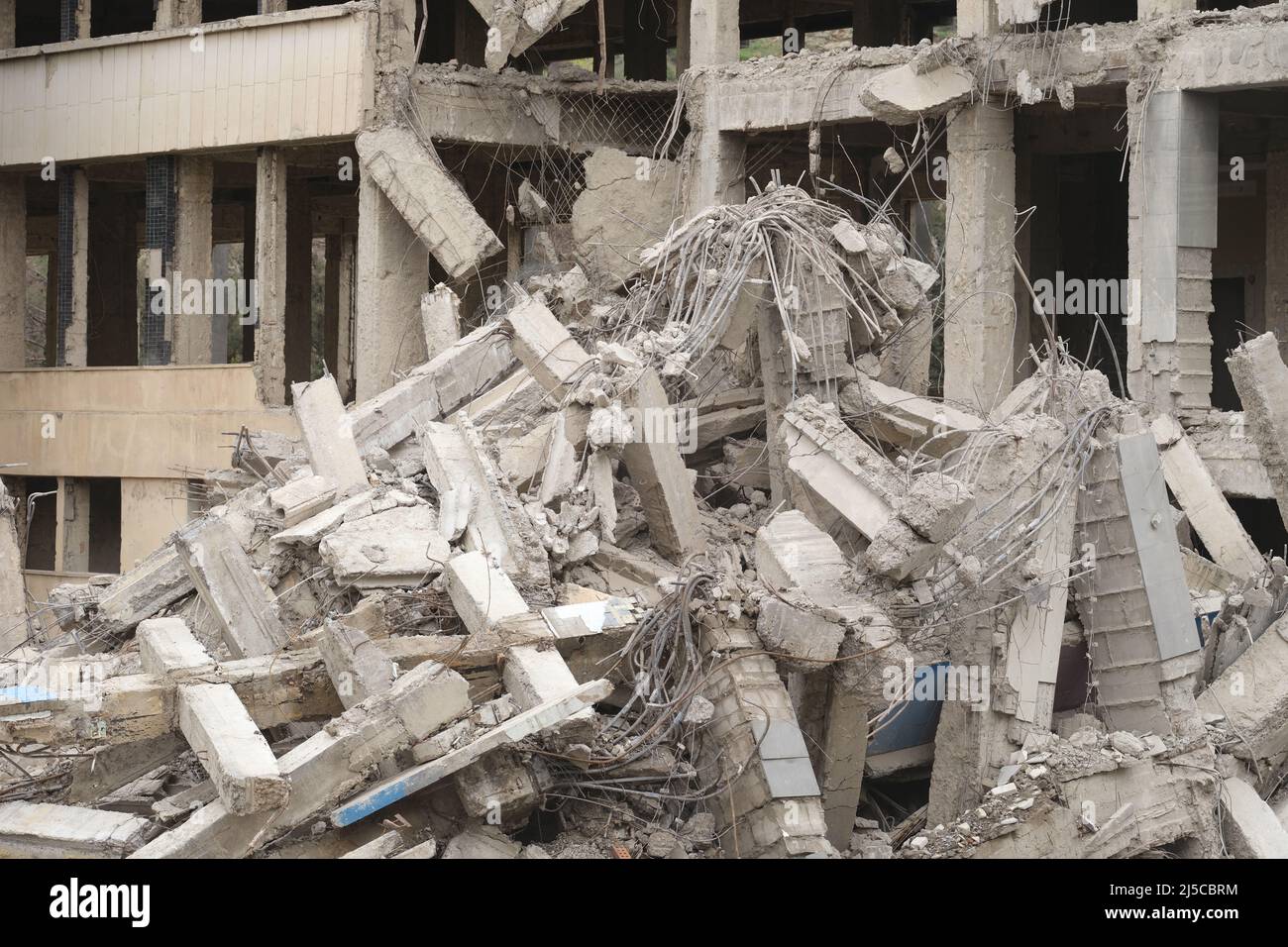 Destruction of city buildings damaged concrete structure during war ...