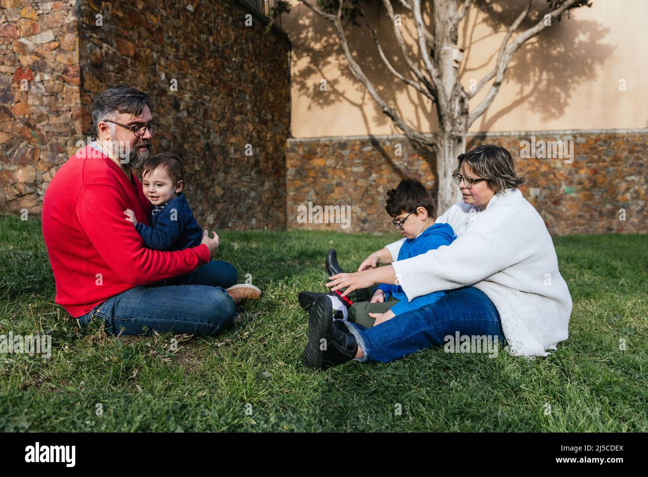 A happy family spending a day together in the park Stock Photo - Alamy