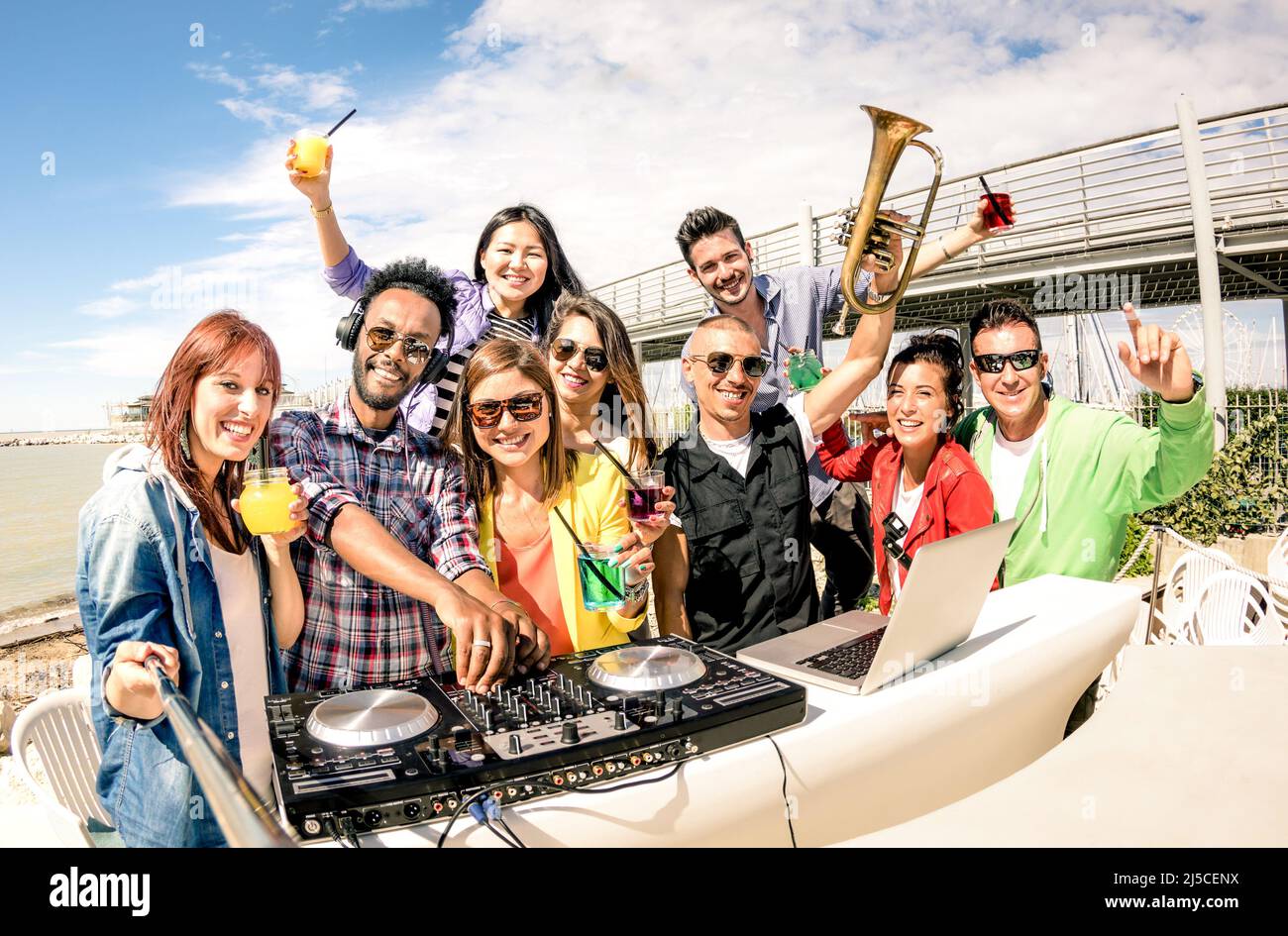 Funky hipster people taking selfie and having fun together at beach ...