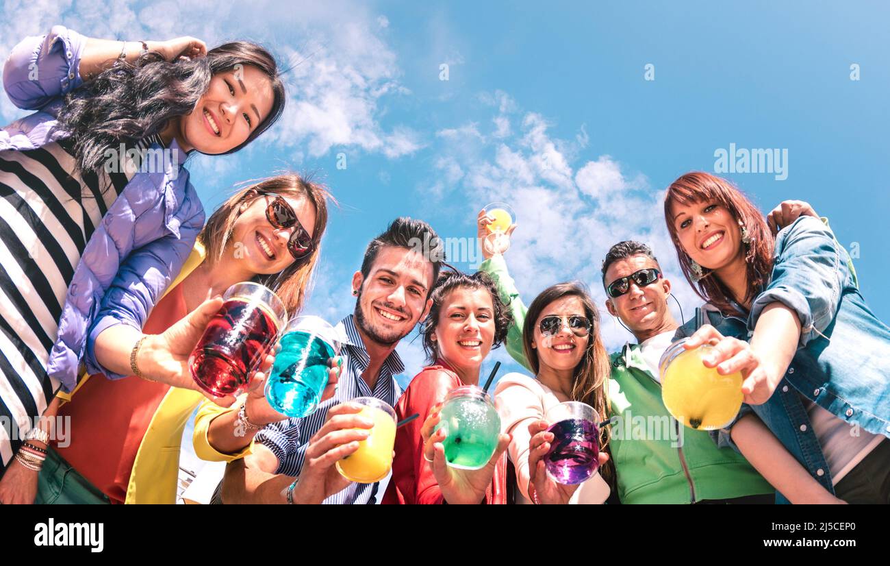 Friends group drinking fancy cocktails at summer beach party - Young ...