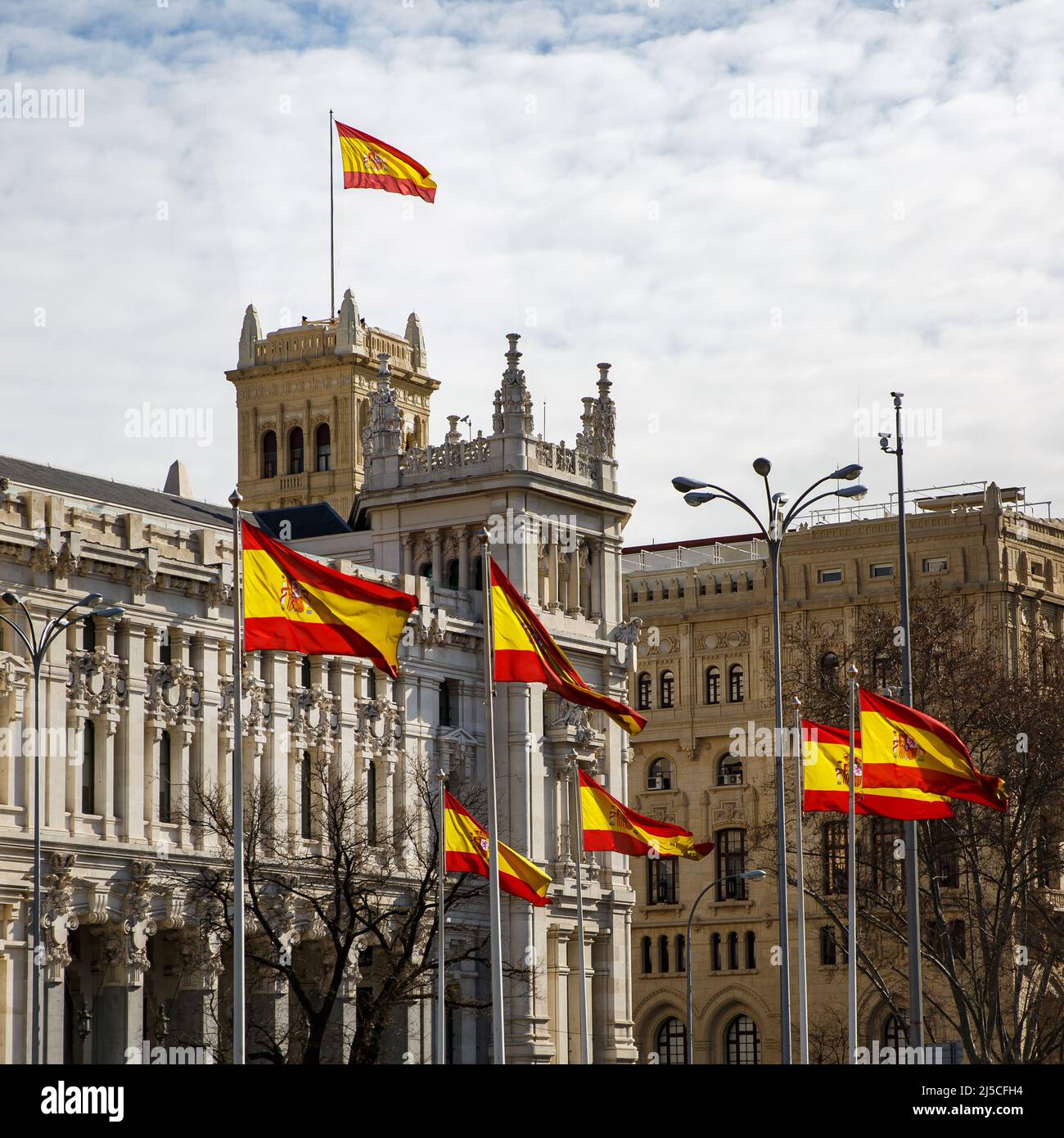 A lot of Spanish flags on buildings background Stock Photo - Alamy