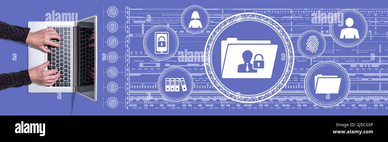 Top view of hands using laptop with symbol of personal data security ...