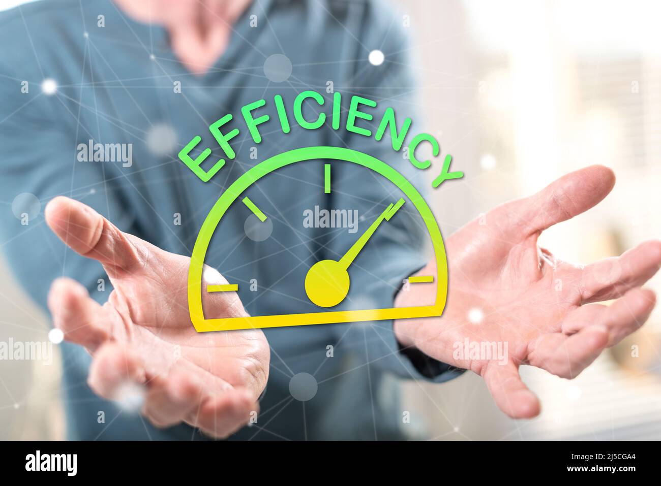 Efficiency concept above the hands of a man in background Stock Photo ...