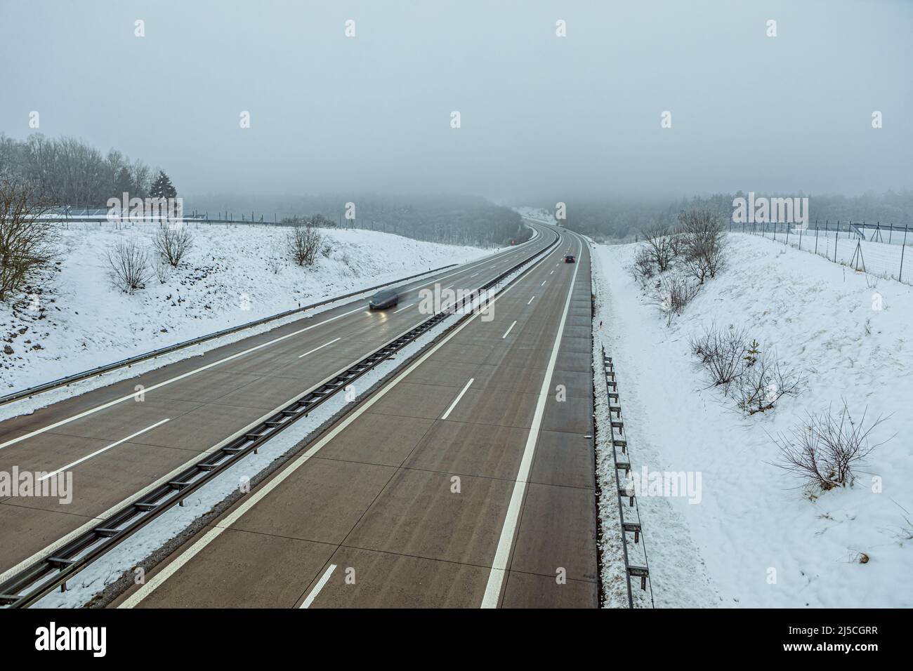 A stretch of german autobahn at diffuse light in Germany Stock Photo ...