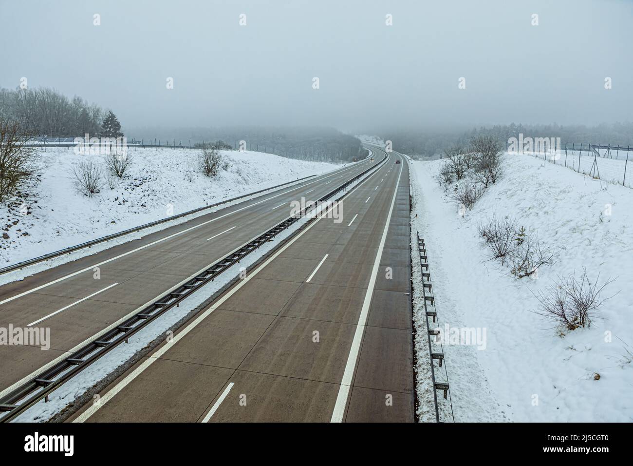 A stretch of german autobahn at diffuse light in Germany Stock Photo ...