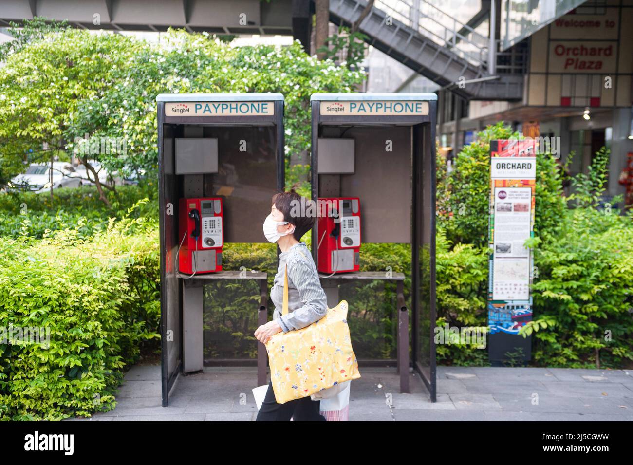 Mar. 12, 2020, Singapore, Republic of Singapore, Asia - A woman walks ...