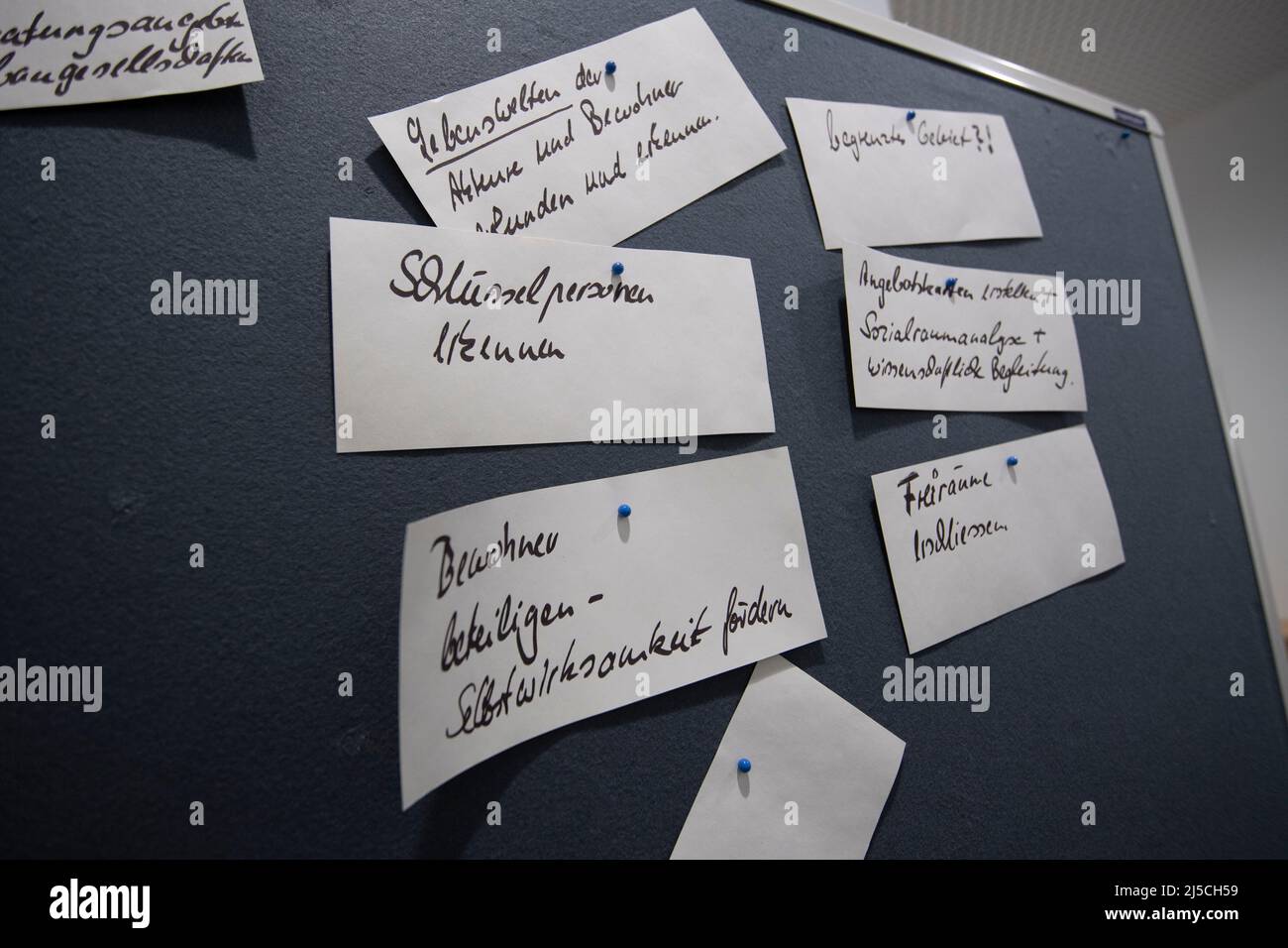 A pinboard with notes, social work in a meeting center, feature ...