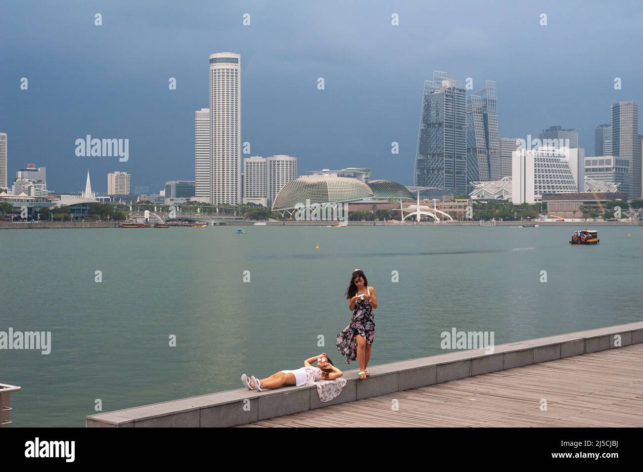 08/26/2019, Singapore, Republic of Singapore, Asia - Thunderstorm atmosphere over Marina Bay ...