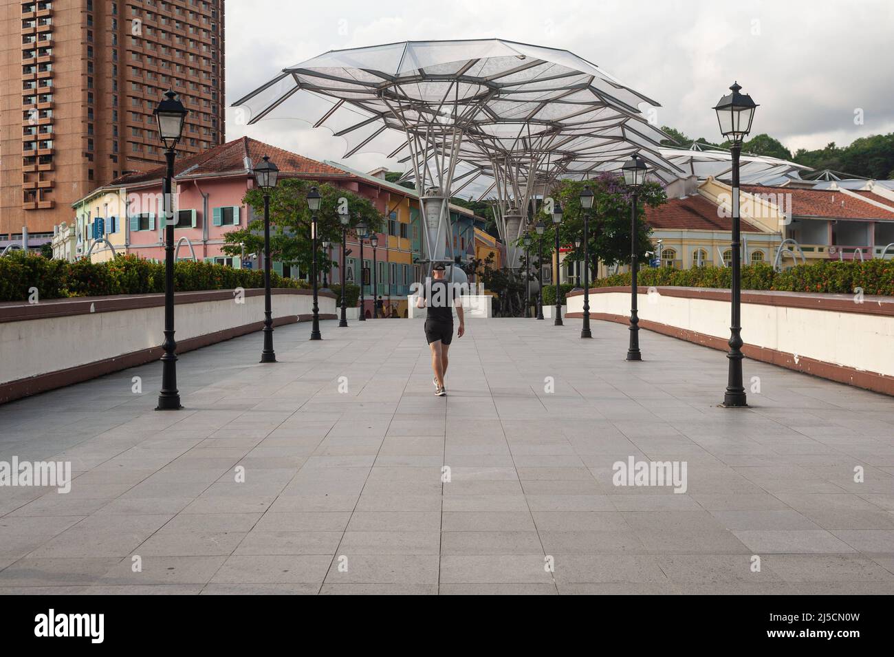 May 28, 2020, Singapore, Republic of Singapore, Asia - A man crosses ...