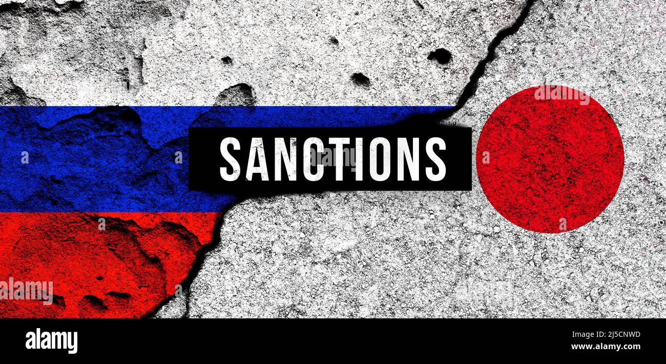Russia and Japan sanctions. National flags background with text ...
