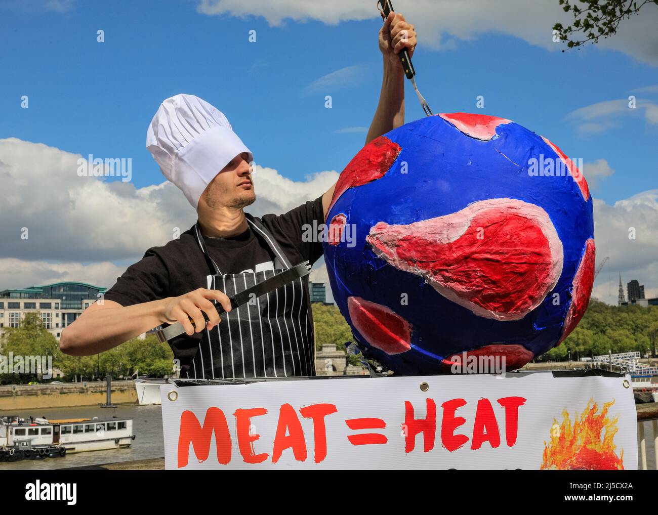 London, UK. 22nd Apr, 2022. A PETA supporter dressed as a chef ...