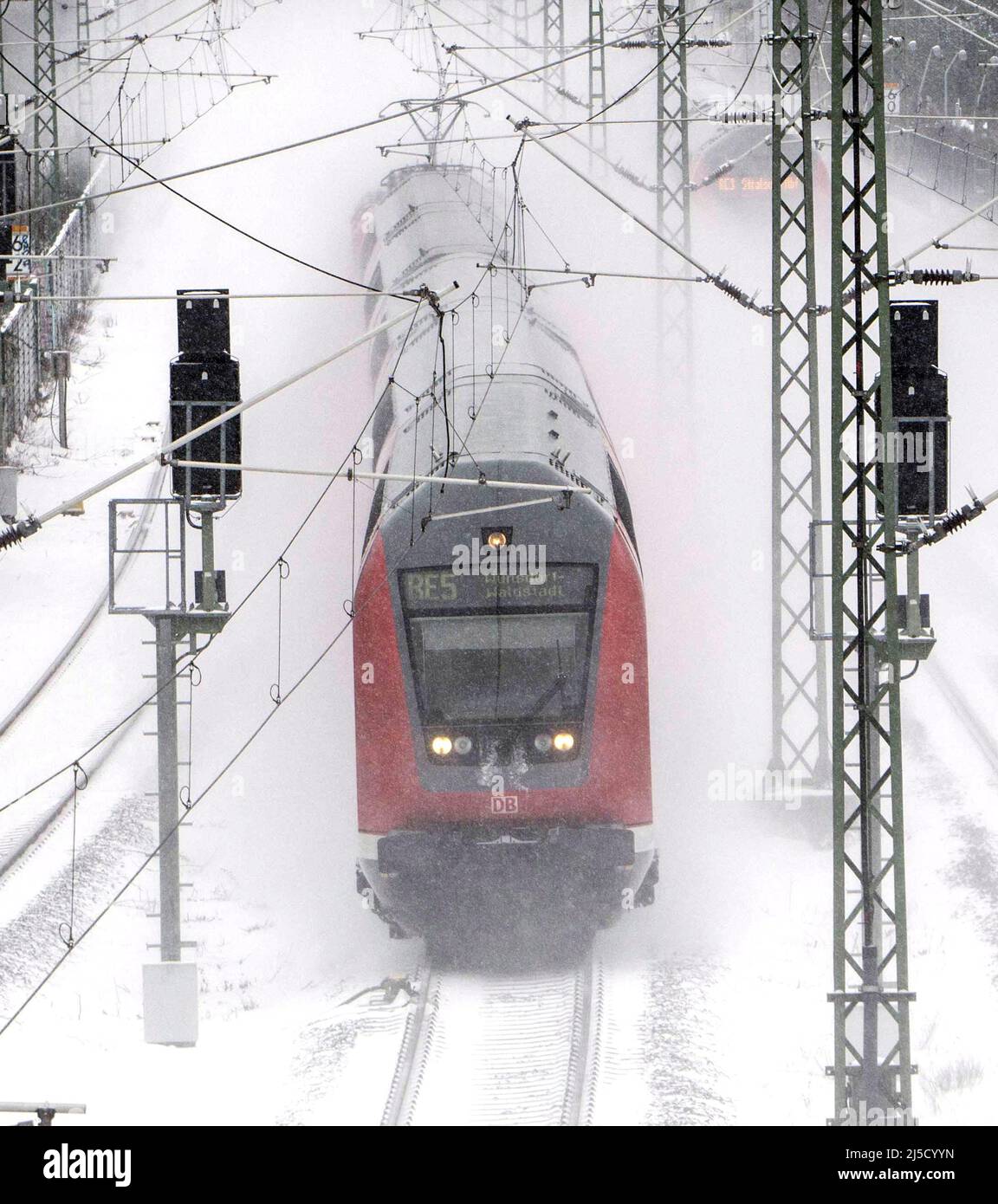 Berlin, DEU, 09.02.21 - A regional train of Deutsche Bahn drives over ...