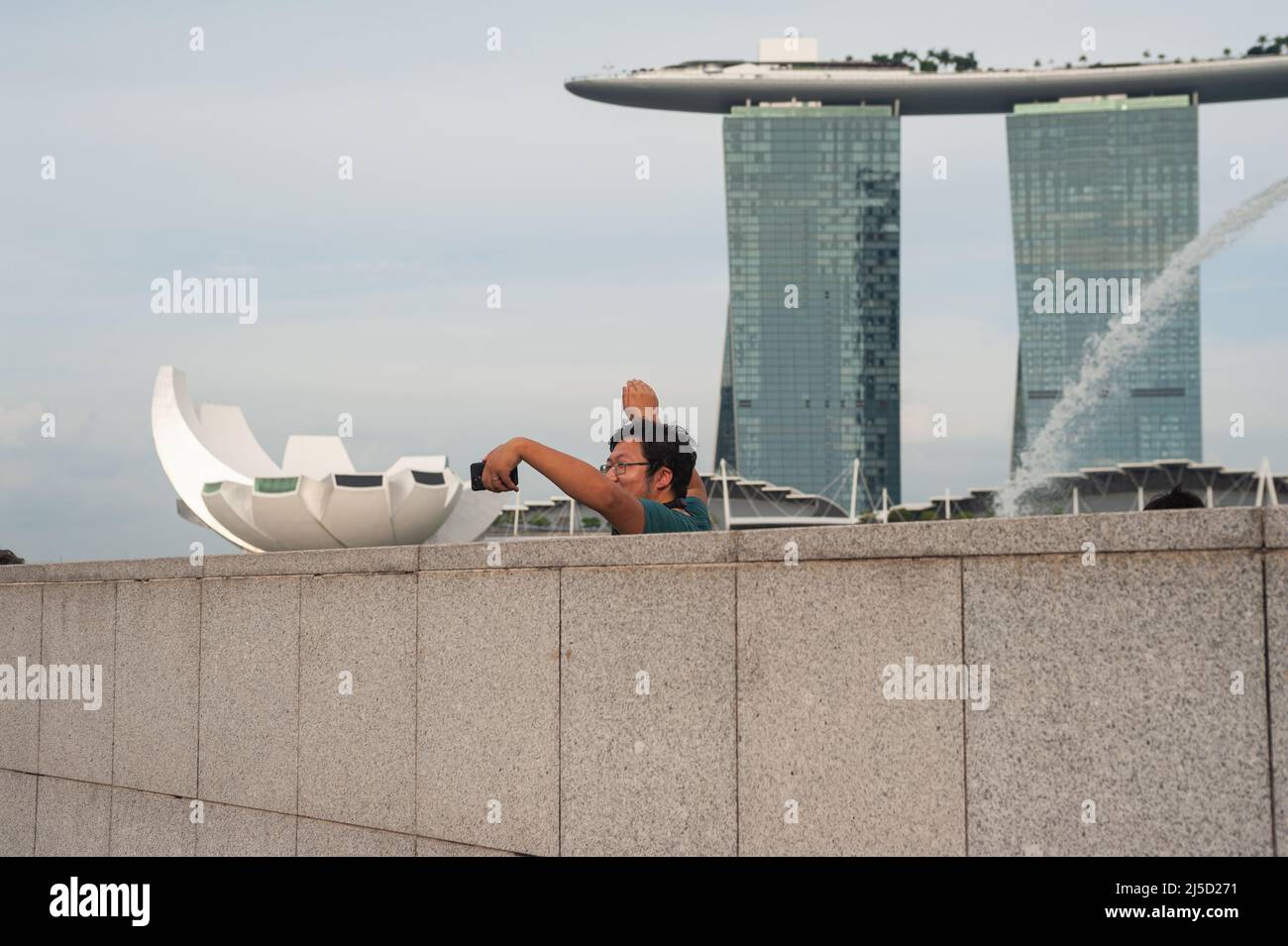 07/25/2019, Singapore, Republic of Singapore, Asia - A man takes a ...