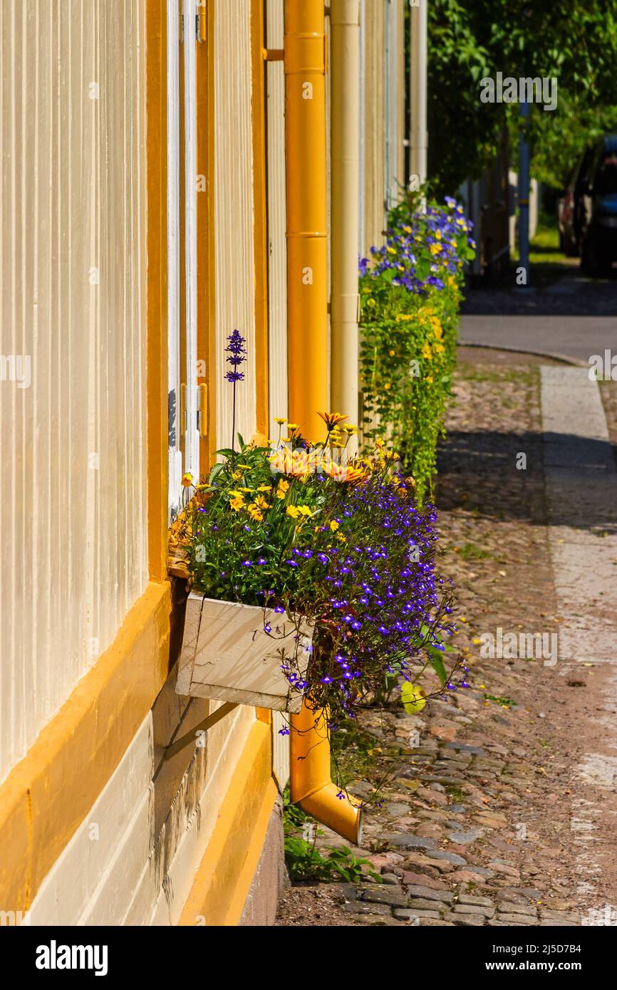 Wood window blooming cottage hi-res stock photography and images - Alamy
