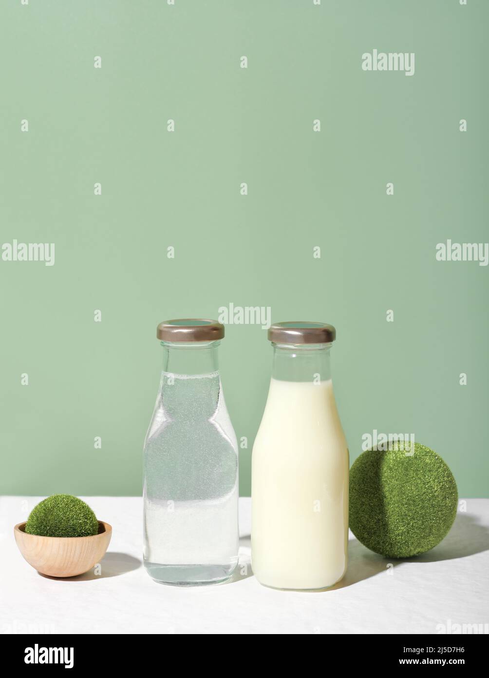 glass bottles with shampoo and body wash gel. refill package, zero ...