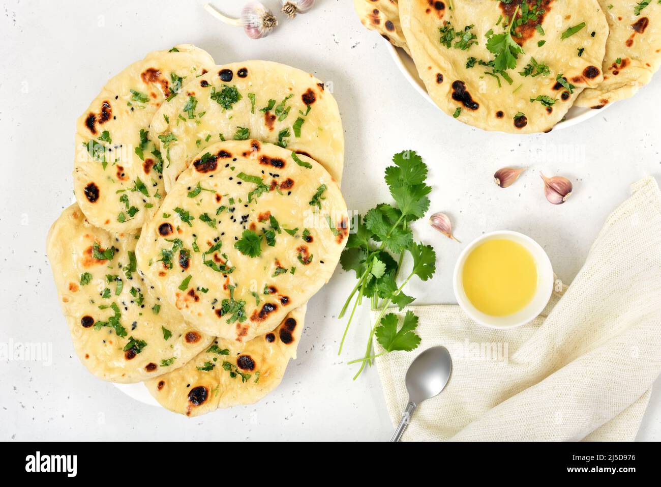 Indian naan bread over light background. Top view, flat lay Stock Photo ...
