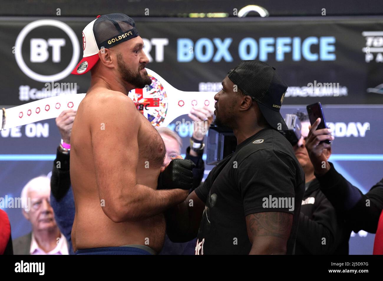 Tyson Fury (left) and Dillian Whyte face off during the weigh in at ...