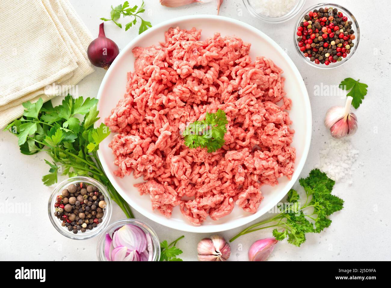 Raw minced meat over light background. Top view, flat lay Stock Photo ...