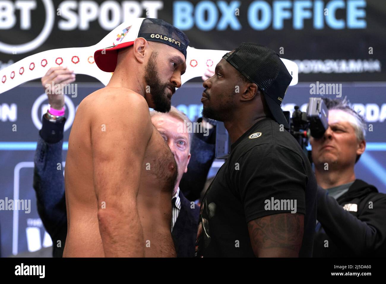 Tyson Fury (left) and Dillian Whyte face off during the weigh in at ...