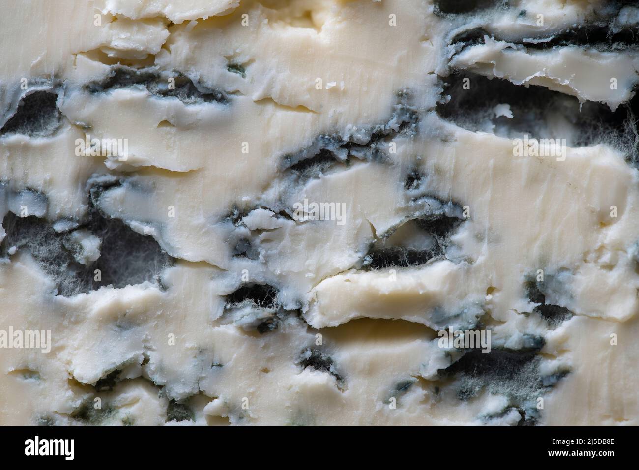 Blue cheese background and texture in the cut, top view, close up ...
