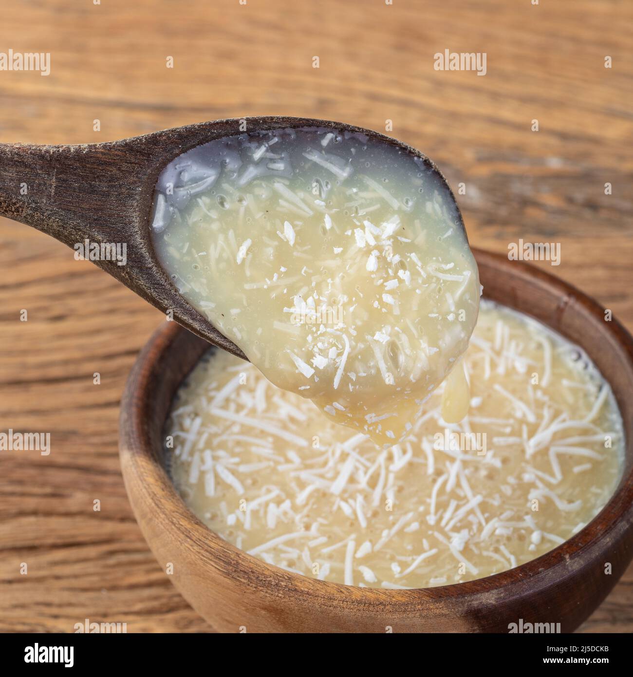 Creamy cocada, traditional brazilian coconut candy with grated coconut ...