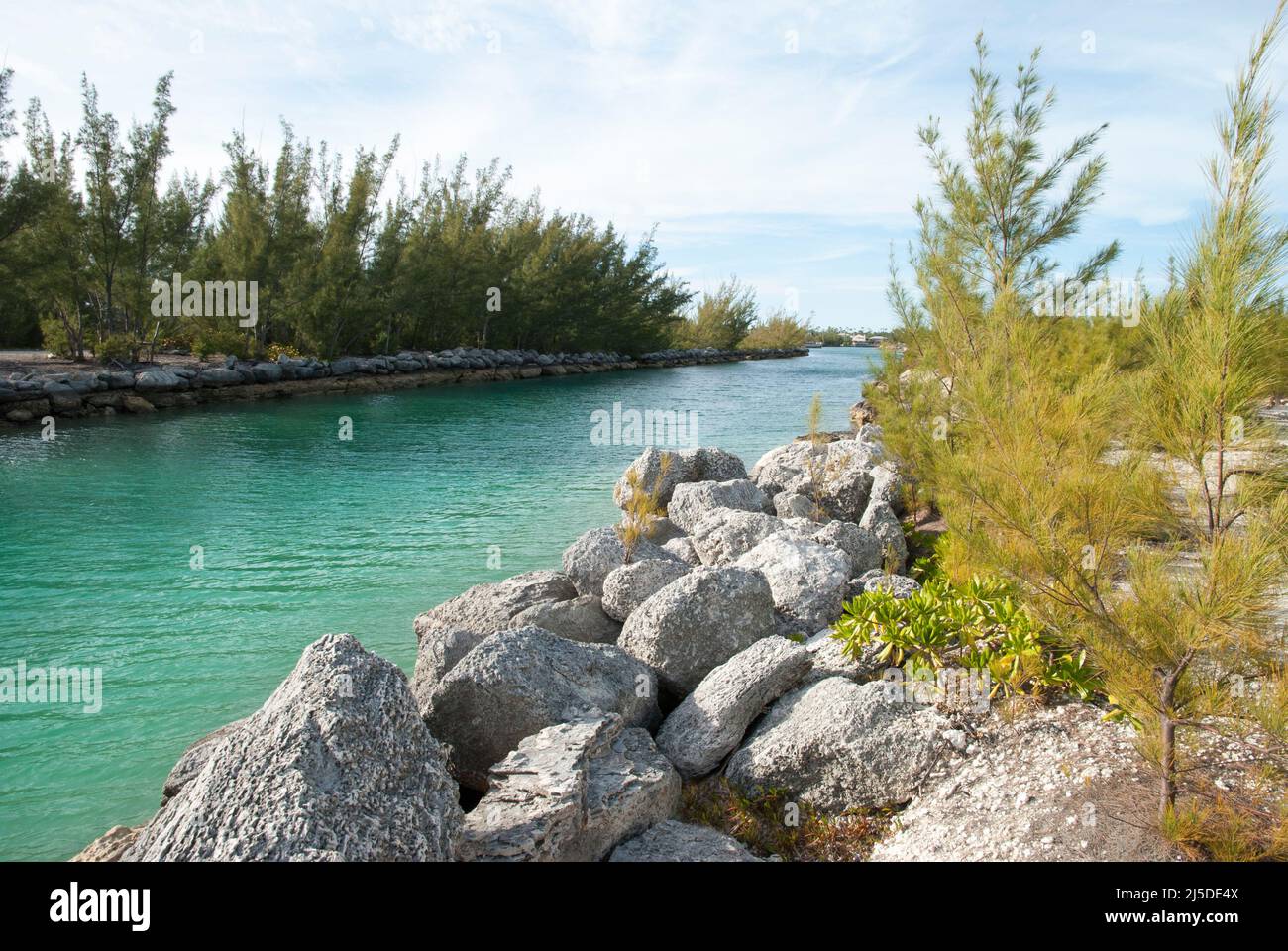 The turquoise color canal on Grand Bahama island connecting Freeport ...