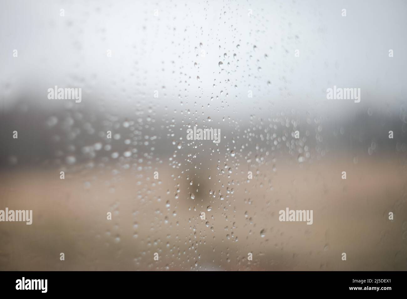Natural pattern of rain drops on window glass surface Stock Photo - Alamy