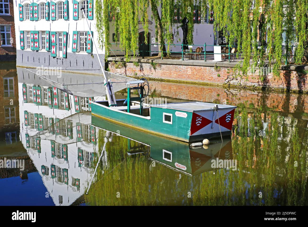 Lier, Belgium - April 9. 2022: View on water moat with old traditional ...