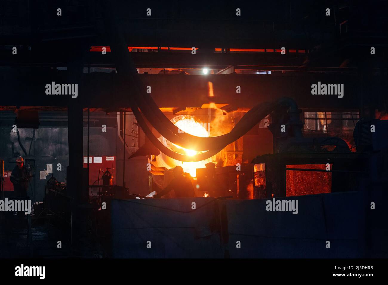 Metal casting process in metallurgical plant Stock Photo - Alamy