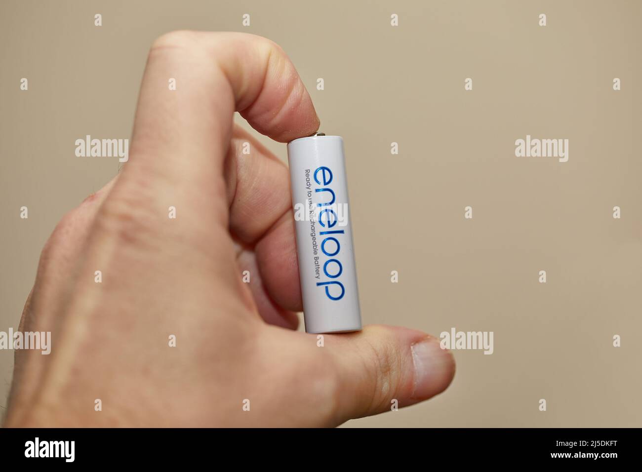 Hand holding aa rechargeable batteries hi-res stock photography and ...