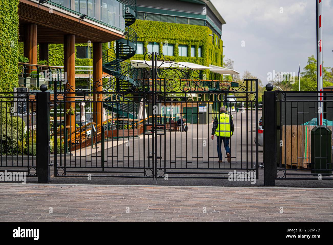 22 April 2022. The gates with the logo of the (AELTC) All England Lawn ...