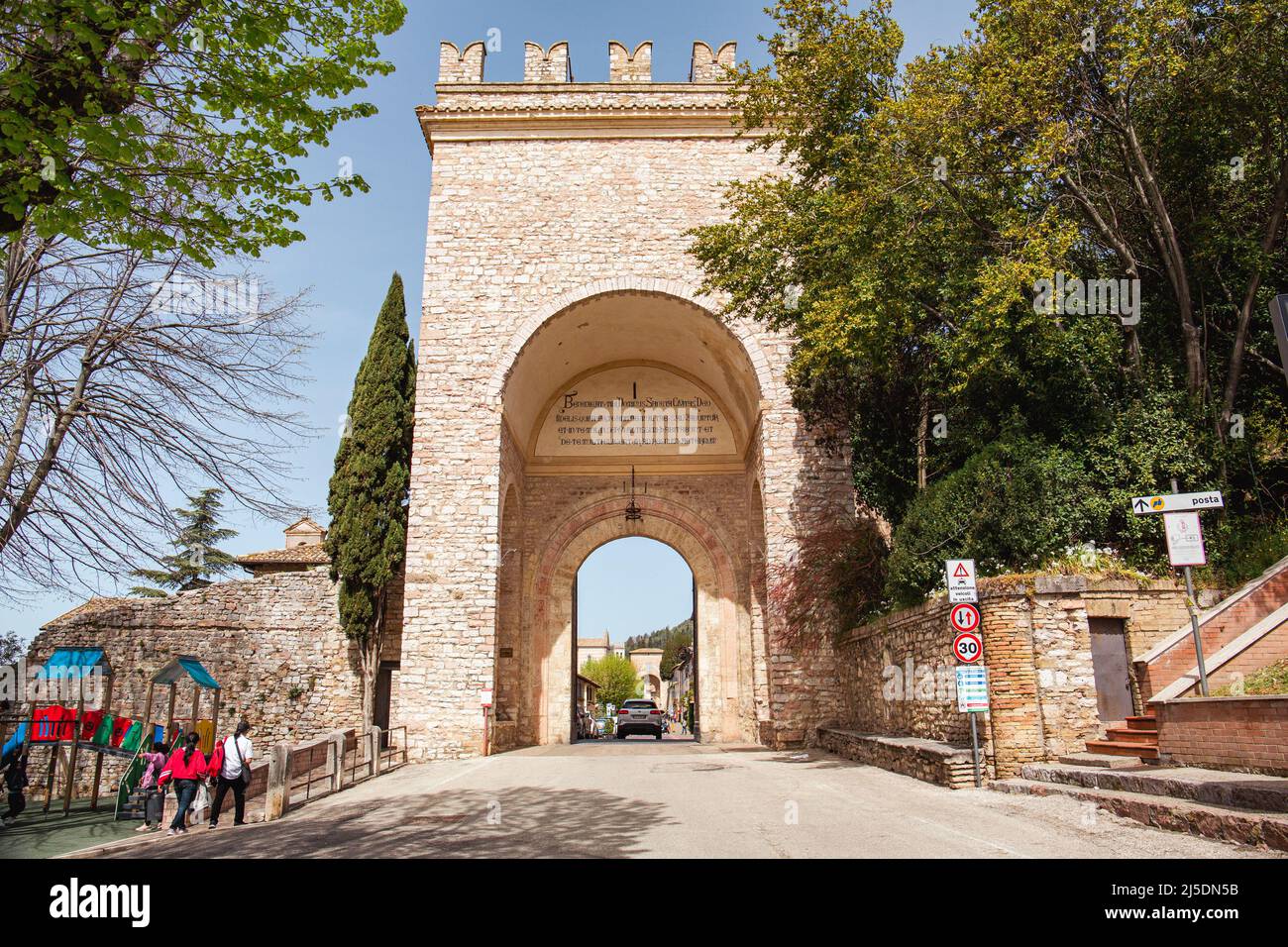 Gate entrance to the town of Assisi, Umbria, Italy. Porta Nuova of ...