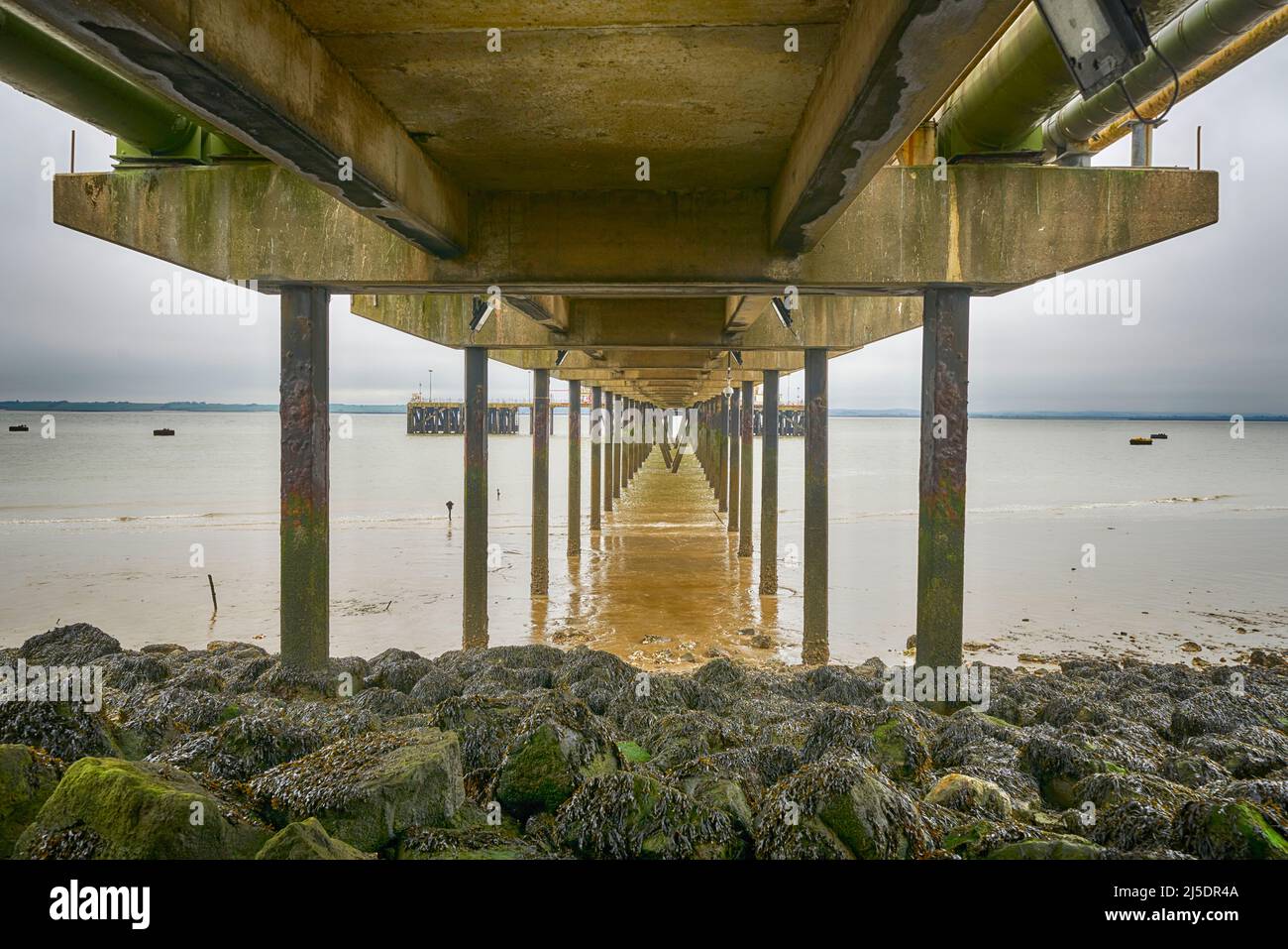 columns of pier canvey island. Structure of seaside pier. Pier by the ...