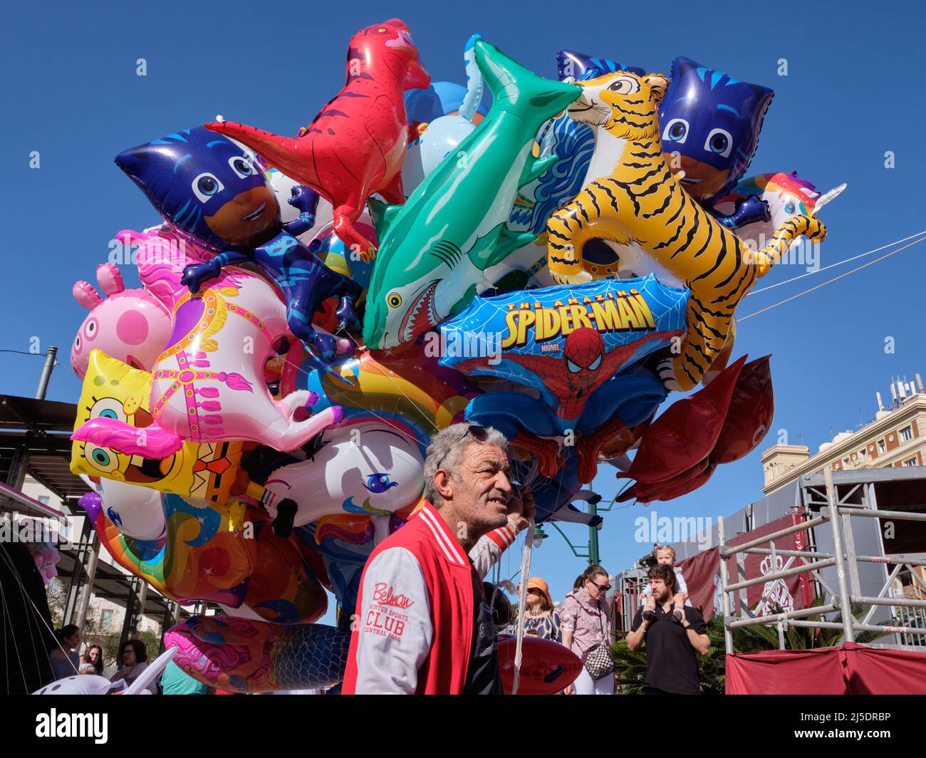 Baloons seller. Holy week 2022, Malaga, Spain Stock Photo - Alamy
