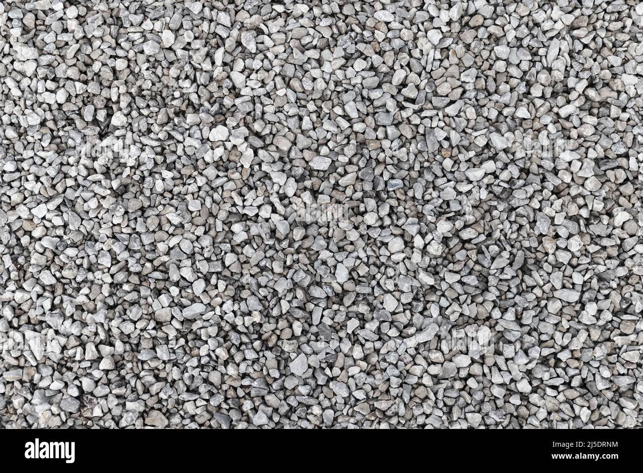 Gray industrial gravel is on the ground, top view, Seamless background ...