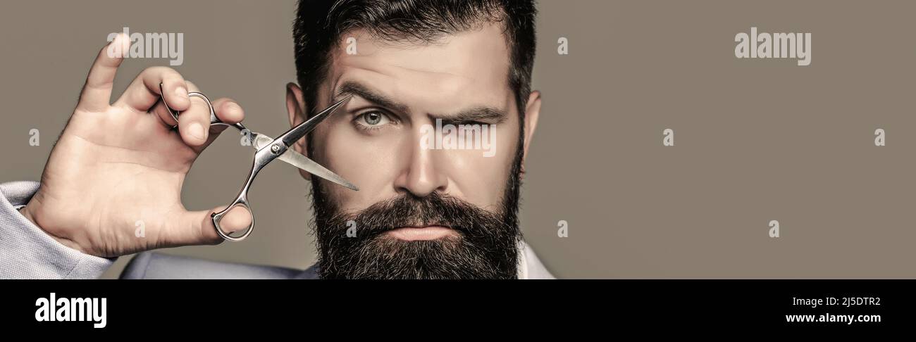 Barber scissors, barber shop. Brutal man, moustache. Male in barbershop ... Barber scissors, barber shop. Brutal man, moustache. Male in barbershop ...
