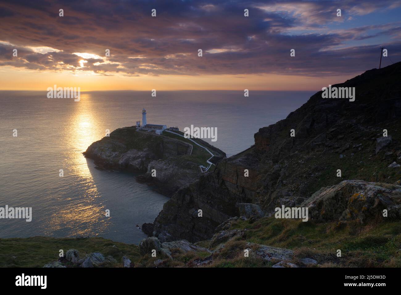 South Stack Lighthouse at Sunset Stock Photo - Alamy