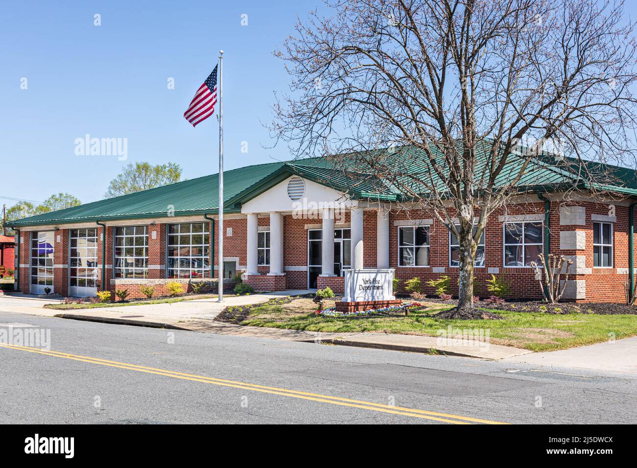 YORK, SC, USA-10 APRIL 2022: York Fire Department building, flag pole ...