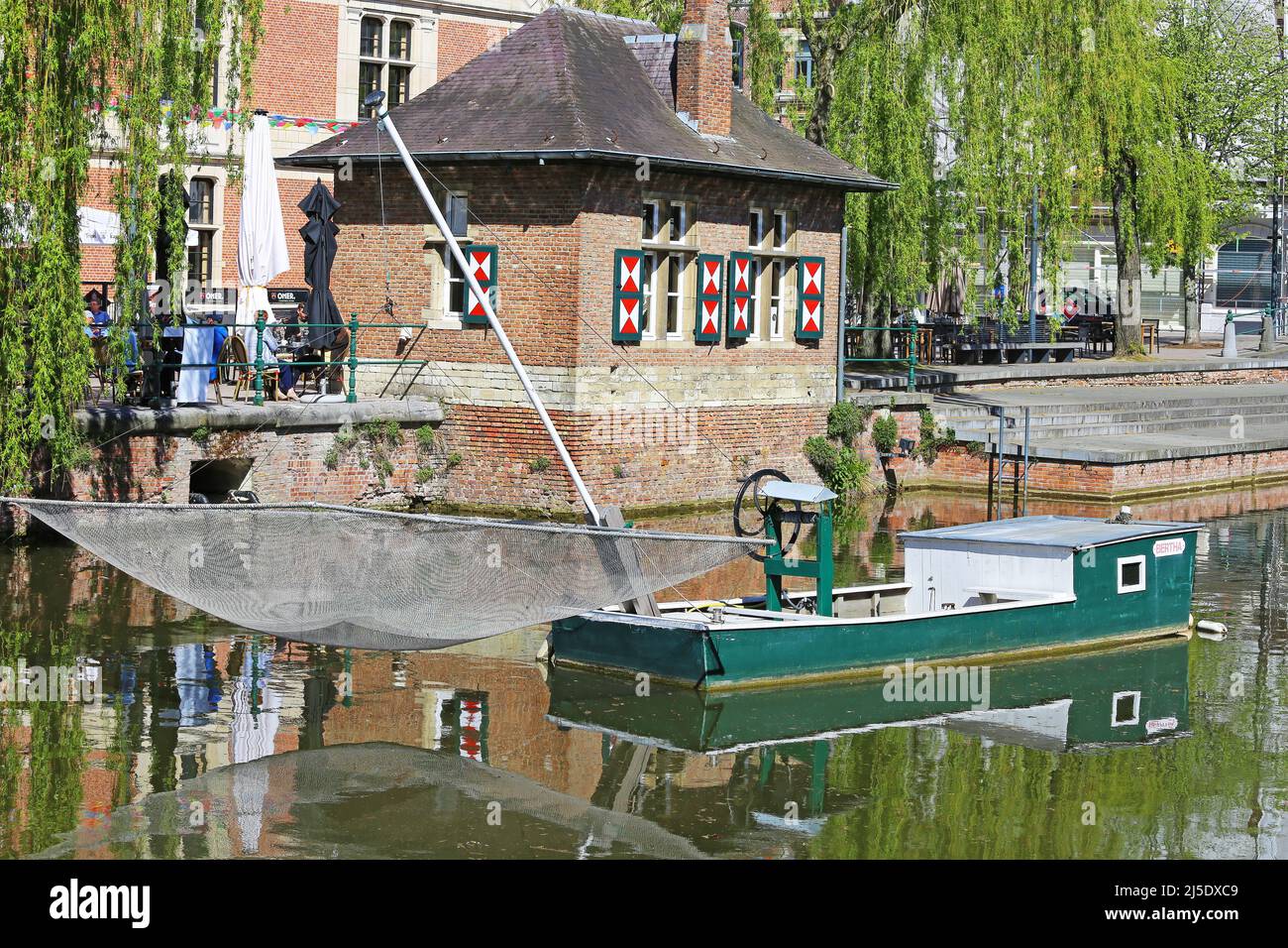 Lier, Belgium - April 9. 2022: View on water moat with old traditional ...